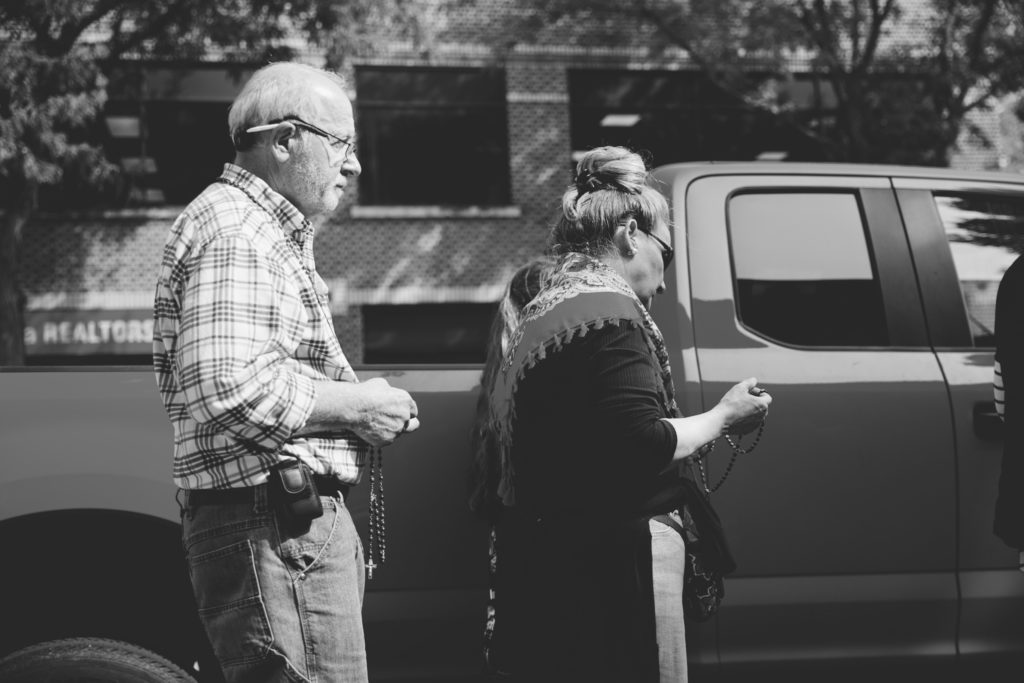 Photos: Catholics hold prayer rally in support of embattled priest, Fr ...
