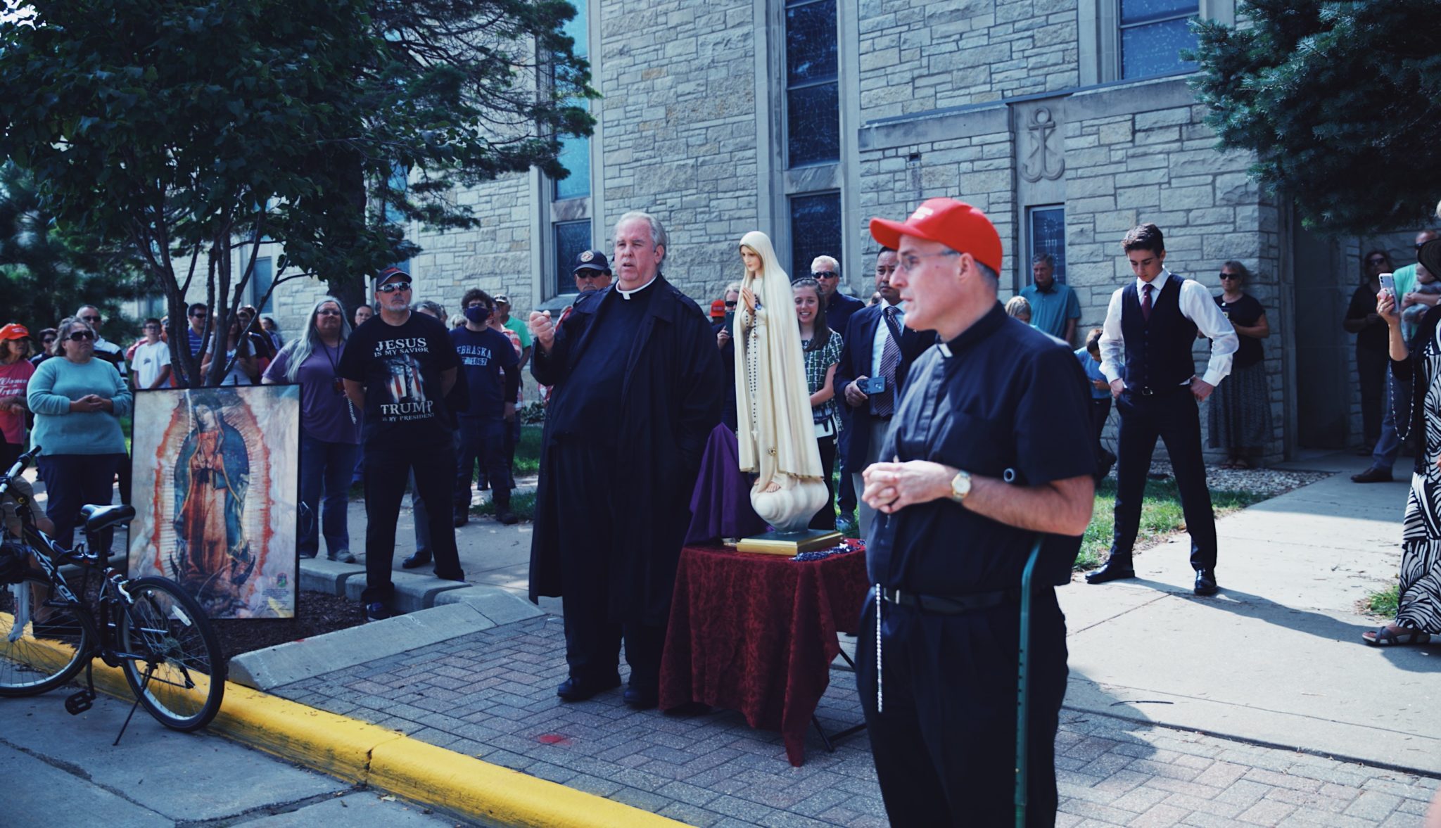 Photos: Catholics hold prayer rally in support of embattled priest, Fr ...