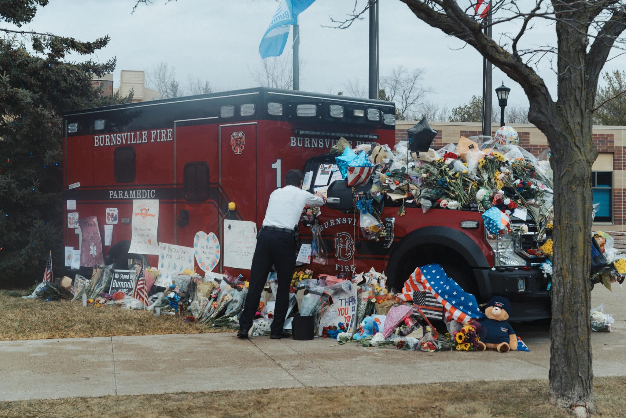 PHOTOS: Mourners pay their respects to fallen Burnsville first ...