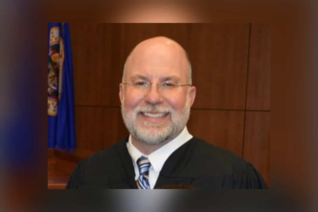 Judge who supported Trump reprimanded after denying felons the right to ...